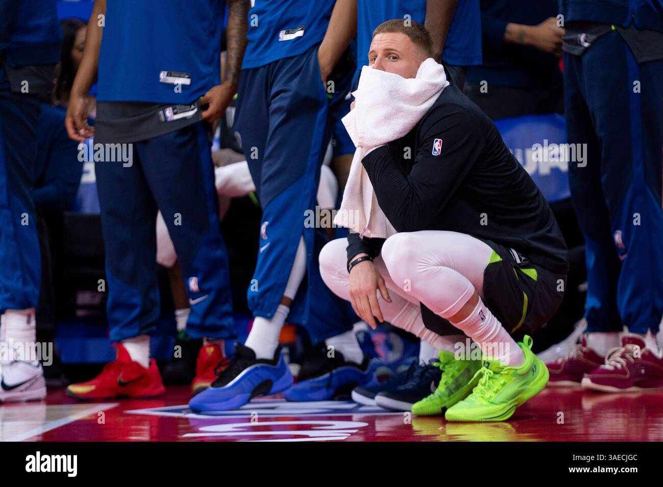 Minnesota Timberwolves' Donte DiVincenzo looks on from the sidelines ...