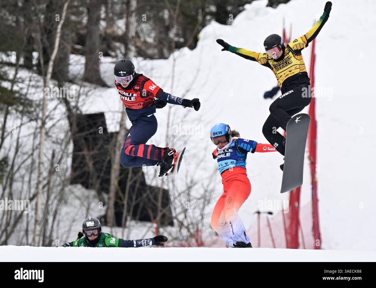 Lea Casta, of France, left, leaps ahead of Sin Sigenthaler, of ...