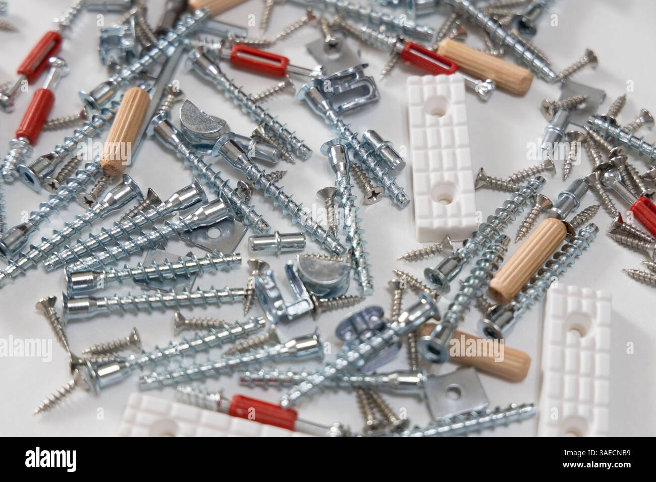 Assorted Screws and Hardware for Furniture on White Background Stock ...