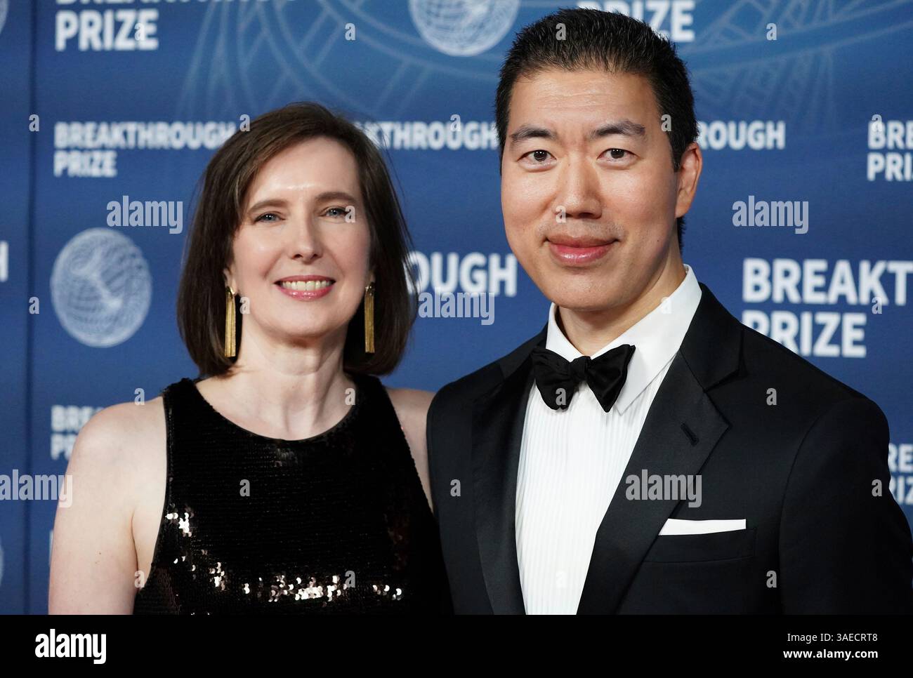 David R. Liu, left, and Julie Liu arrive at the 11th Breakthrough Prize ...