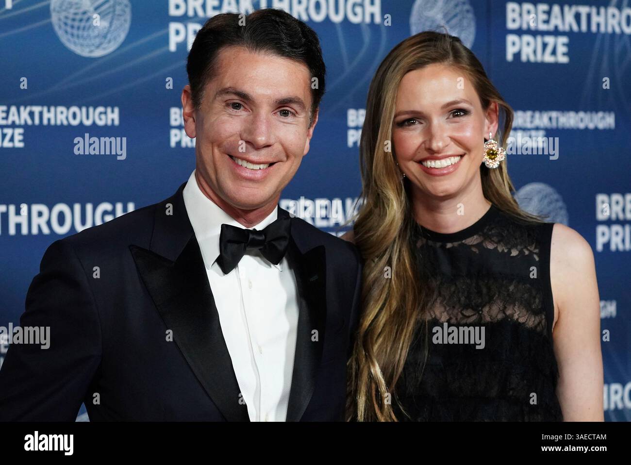 Josh Fink, left, and Filipa Fink arrive at the 11th Breakthrough Prize ...
