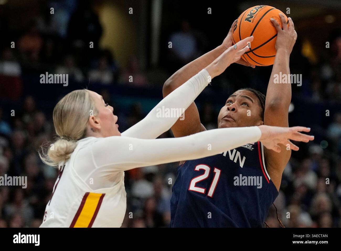 UConn forward Sarah Strong (21) shoots against South Carolina forward ...
