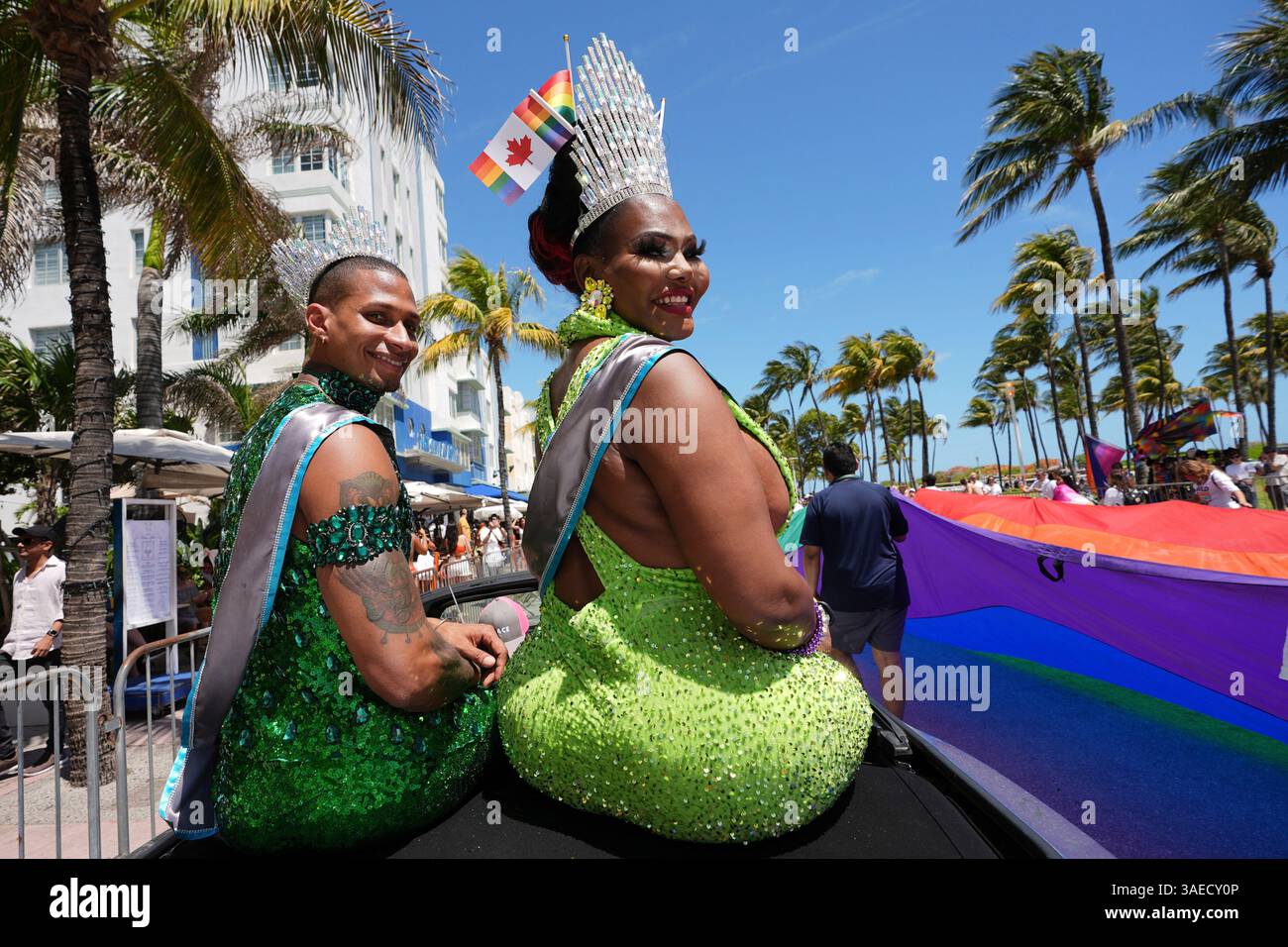 Mr. and Mrs. Miami Beach Pride ride along the parade route during the ...