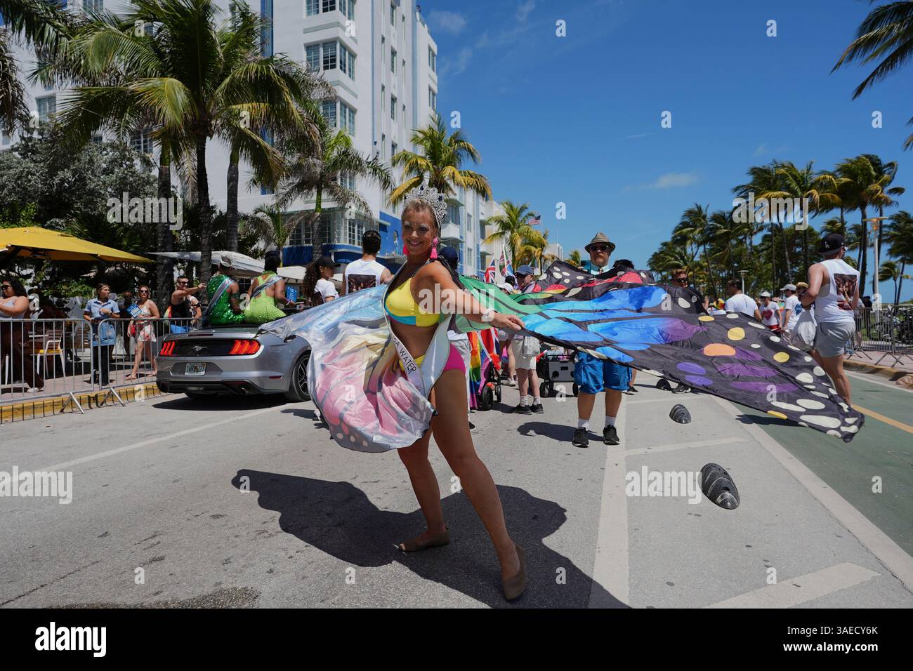 Mrs. Elemental USA Water dances during the Miami Beach Pride parade ...