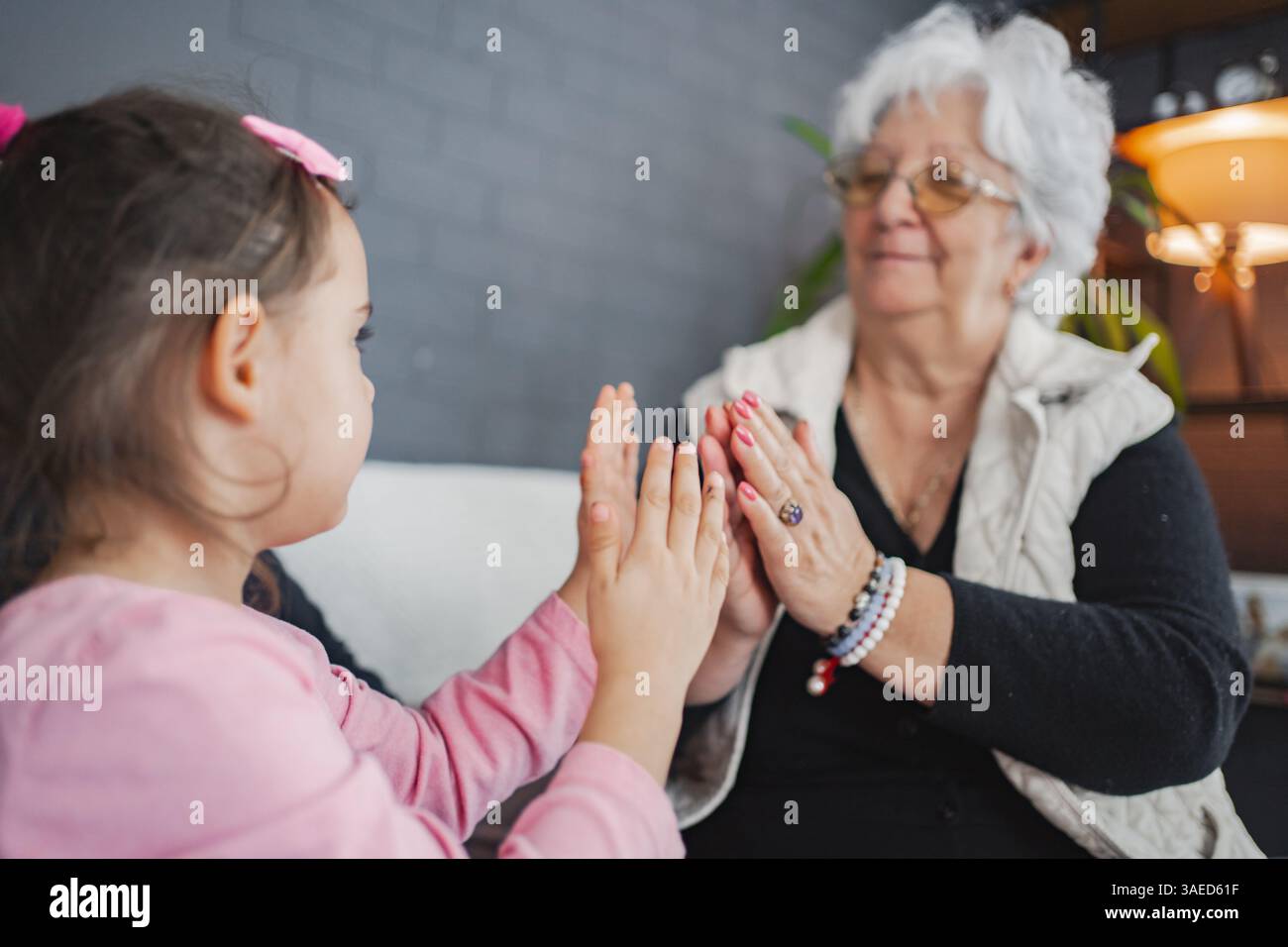 Grandmother granddaughter sharing joyful hi-res stock photography and ...