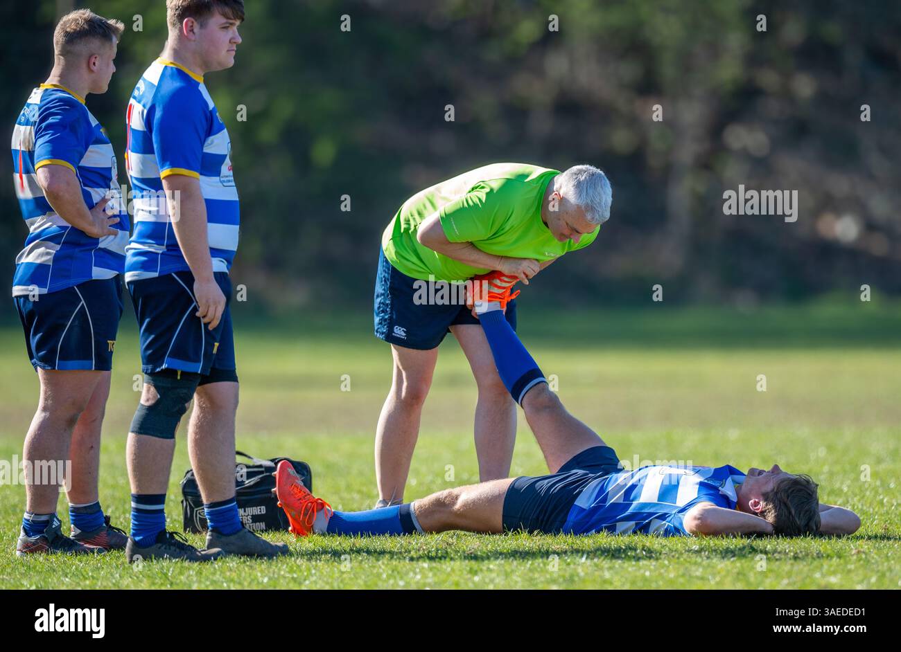 Mens amateur Rugby Union game, player receiving medical treatment to ...