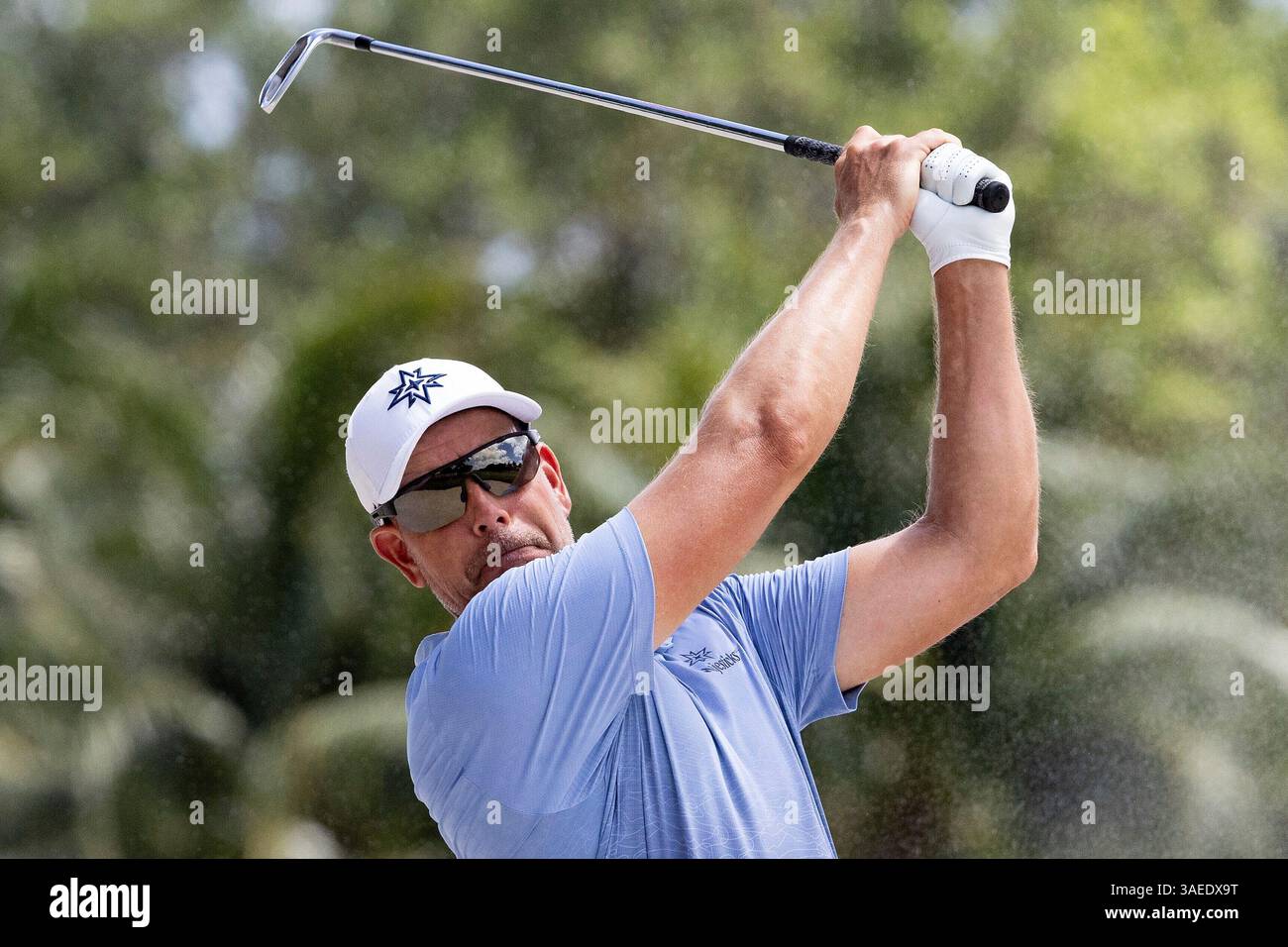Co-Captain Henrik Stenson of Majesticks GC hits his shot from a bunker ...