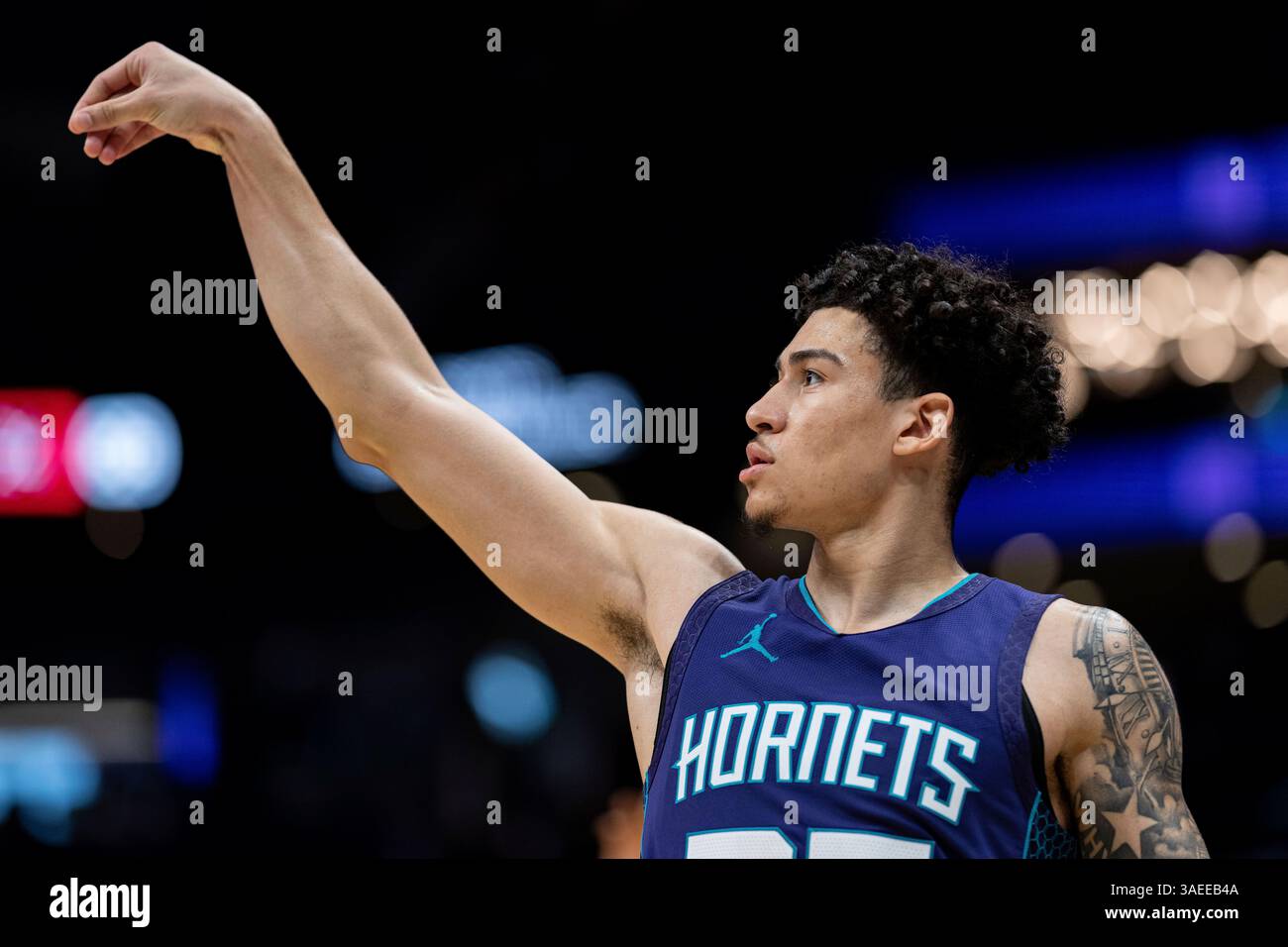 Charlotte Hornets guard KJ Simpson (25) watches his shot during the ...