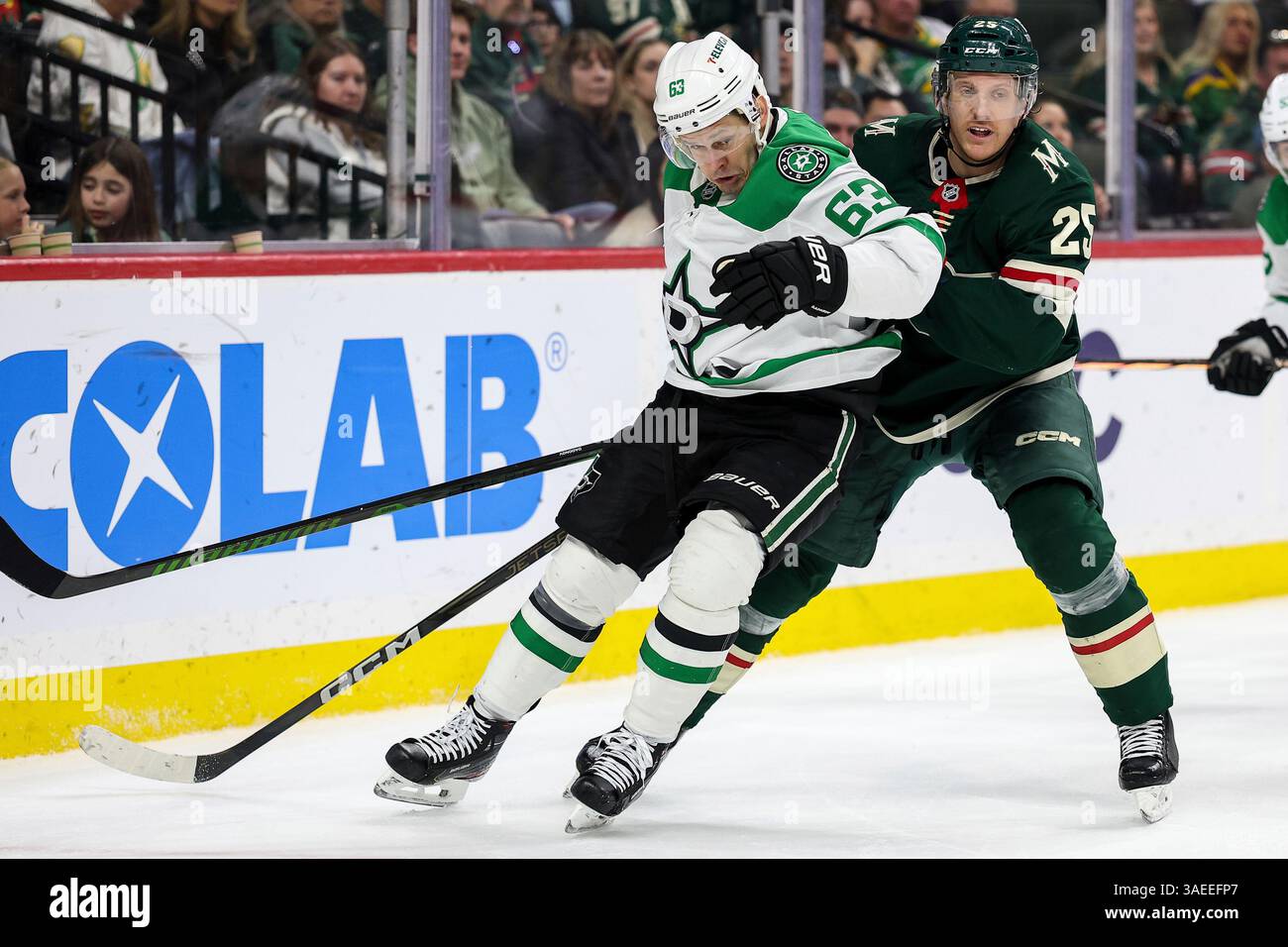 Dallas Stars right wing Evgenii Dadonov, left, and Minnesota Wild ...