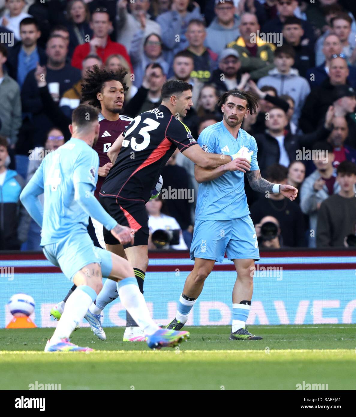 Birmingham, UK. 05th Apr, 2025. Emiliano Martinez (AV) Jota Silva (NF) come together at the ...