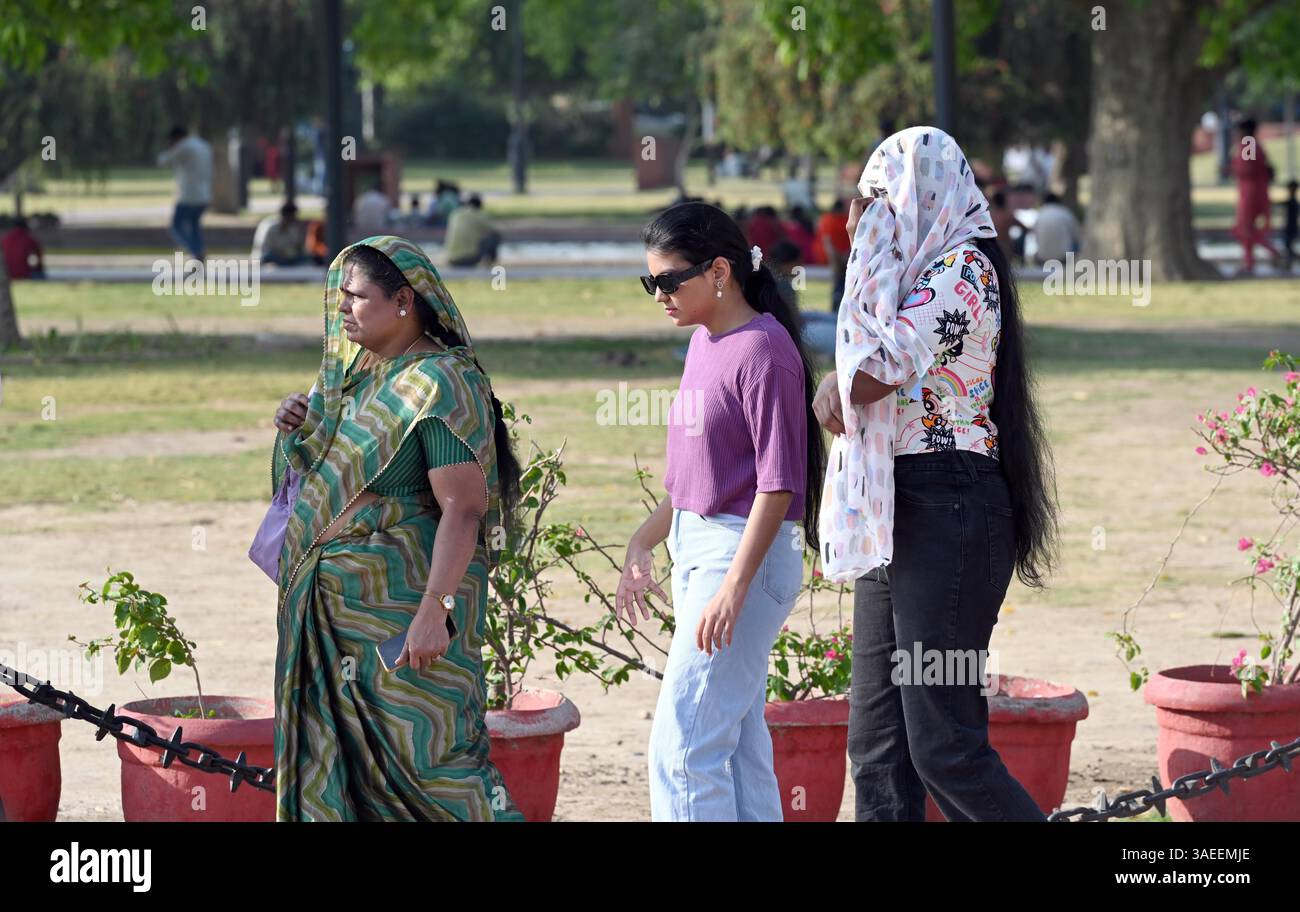 NEW DELHI, INDIA - APRIL 6: Visitors out on a hot afternoon at India ...