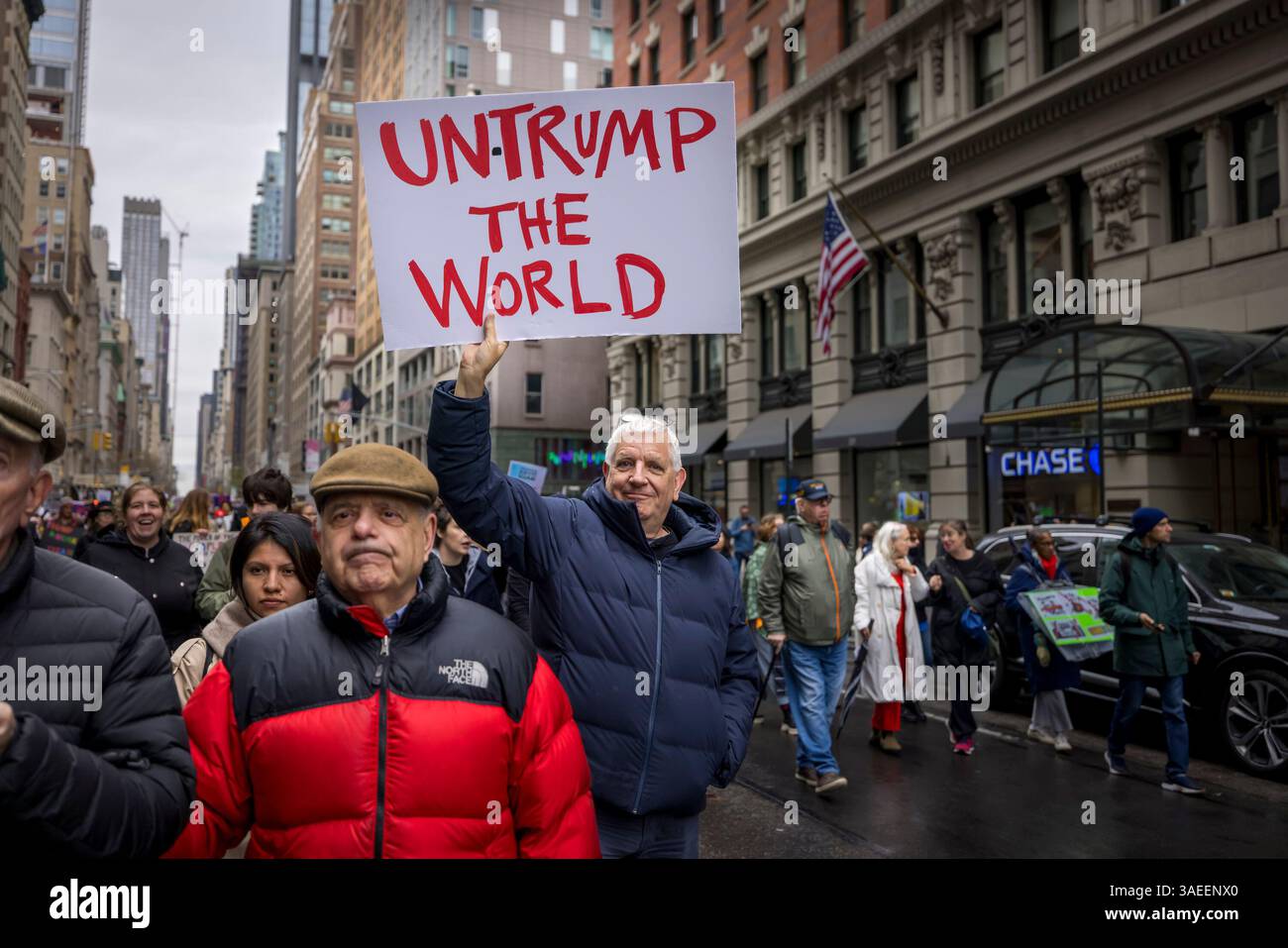 NEW YORK, NEW YORK - APRIL 5: A person holds a sign that reads ...