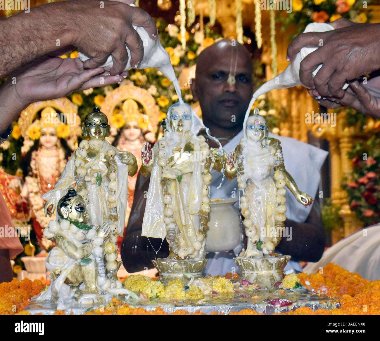 PATNA, INDIA - APRIL 6: Saints offering milk on lord Ram, Laxman & Sita ...