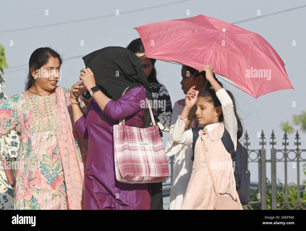 NEW DELHI, INDIA - APRIL 6: Visitors out on a hot afternoon at India ...