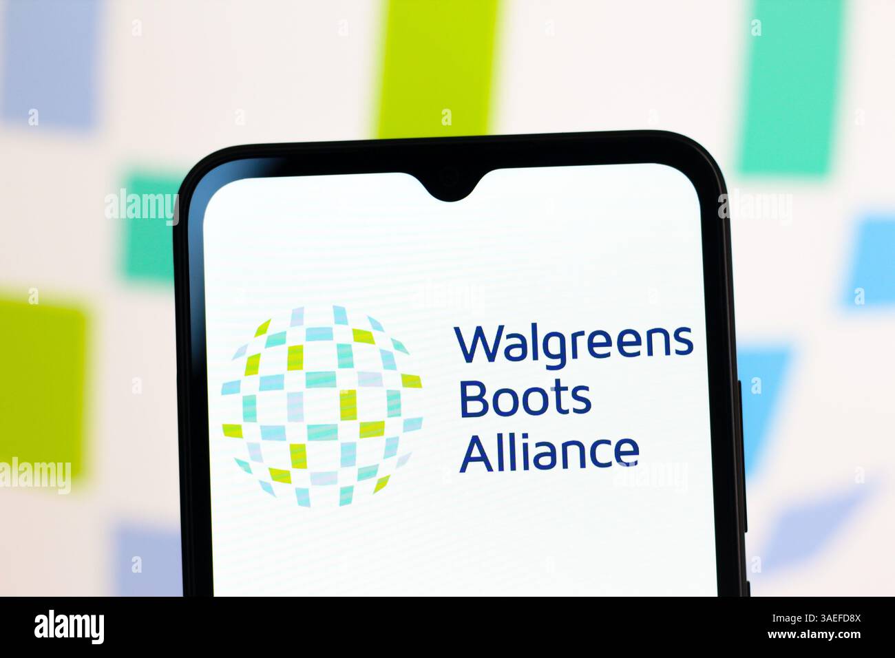 In this photo illustration, the Walgreens Boots Alliance (WBA) logo is seen displayed on a ...