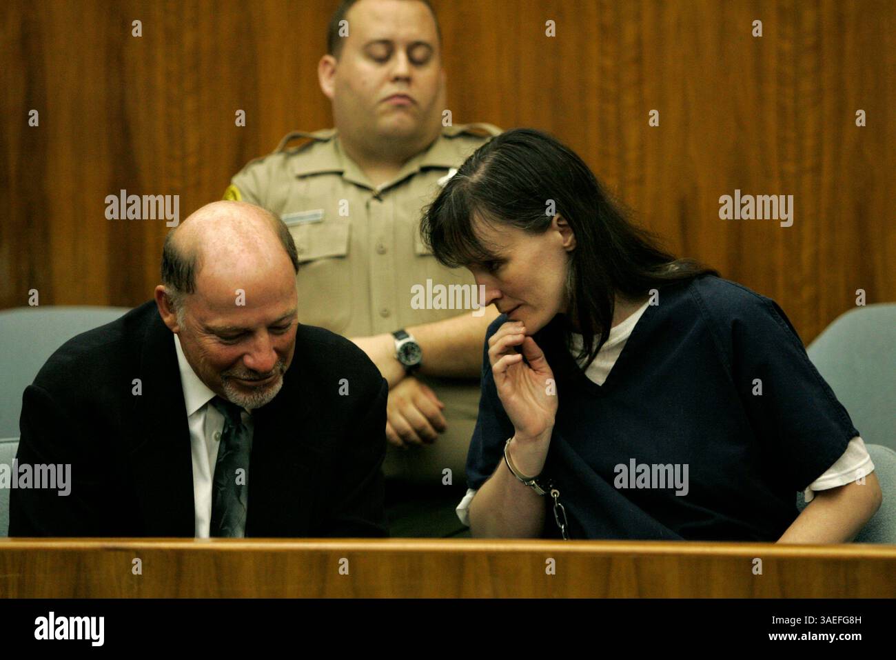 July 25, 2008, San Diego, California LORRIE BOETTGER, right, listens to ...