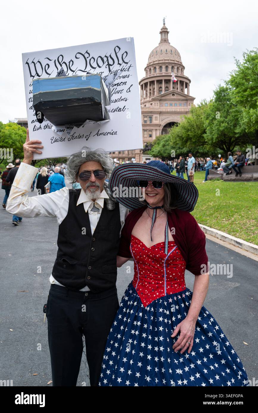 Protesting couple at HANDS OFF rally at Texas State Capitol in Austin ...
