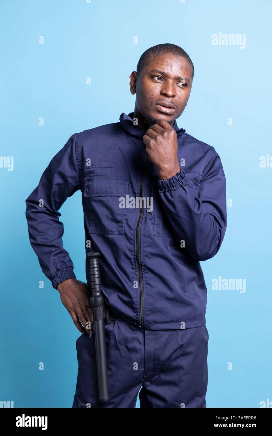 Pensive african american bodyguard thinking about his duty, working on ...