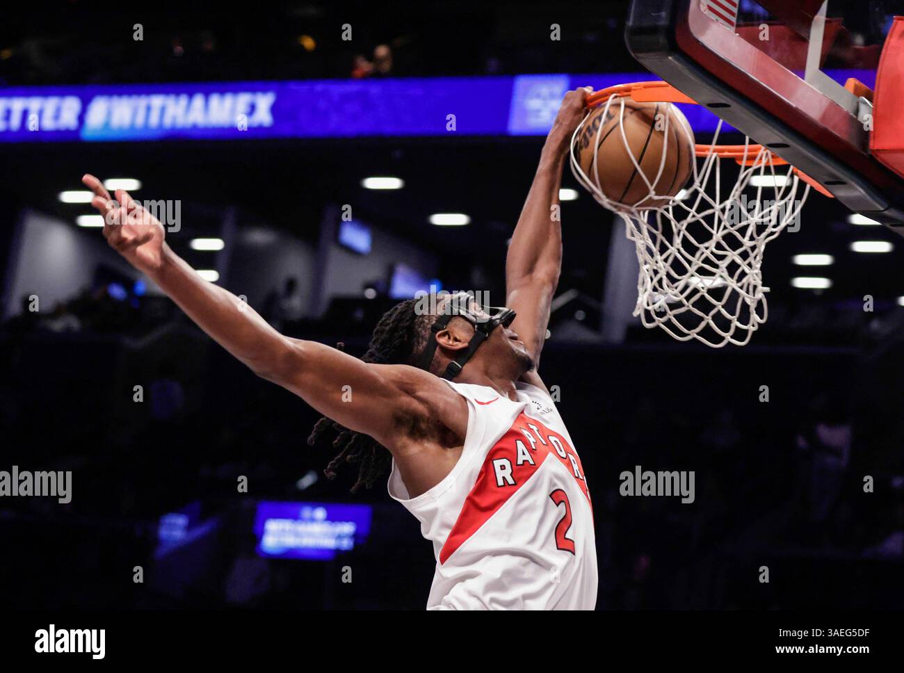 Toronto Raptors' Jonathan Mogbo (2) shoots during the second half of an ...