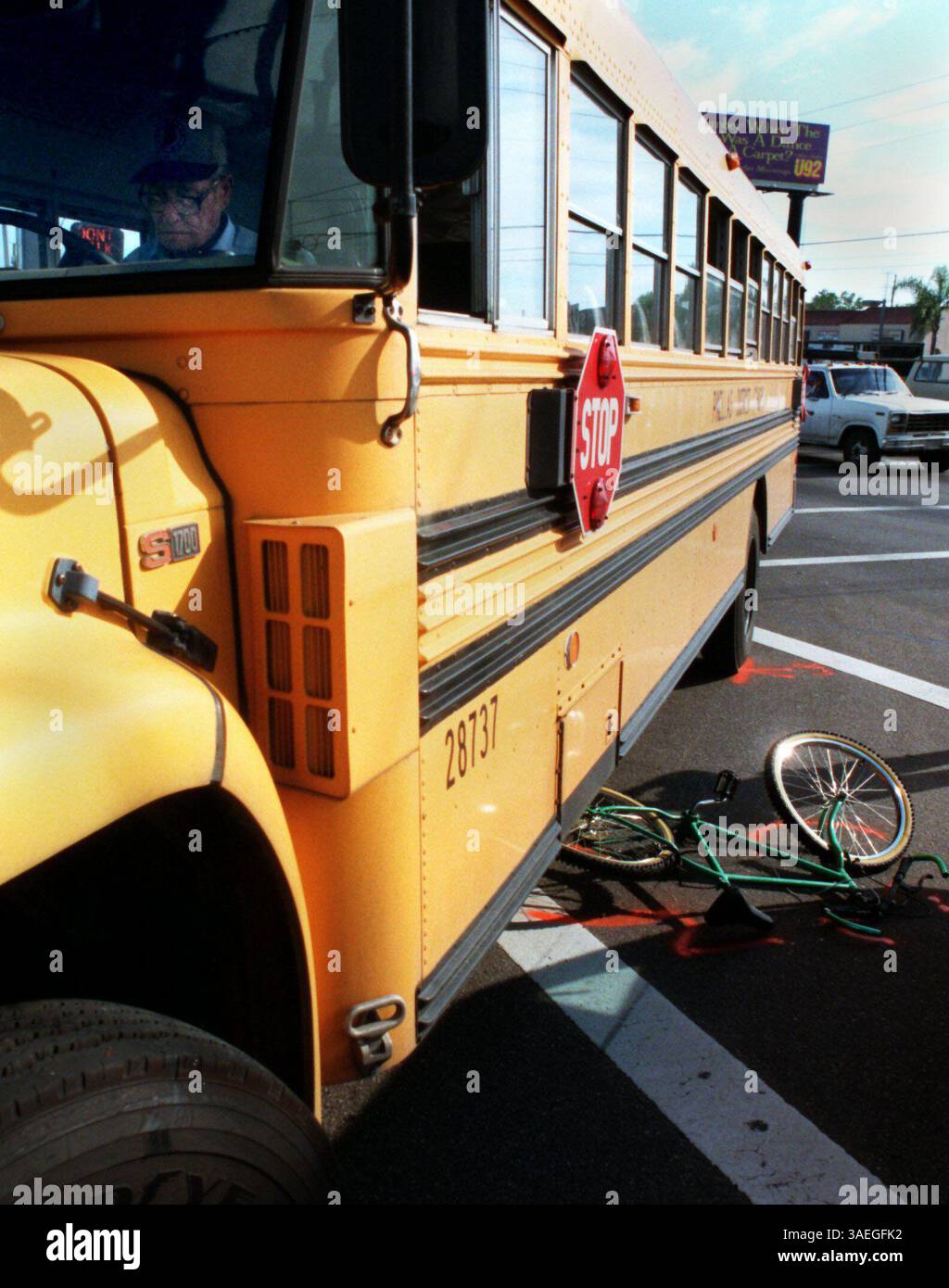 LIB NOTE: bus driver is Robert D. Willhoite bike rider is Brian L ...