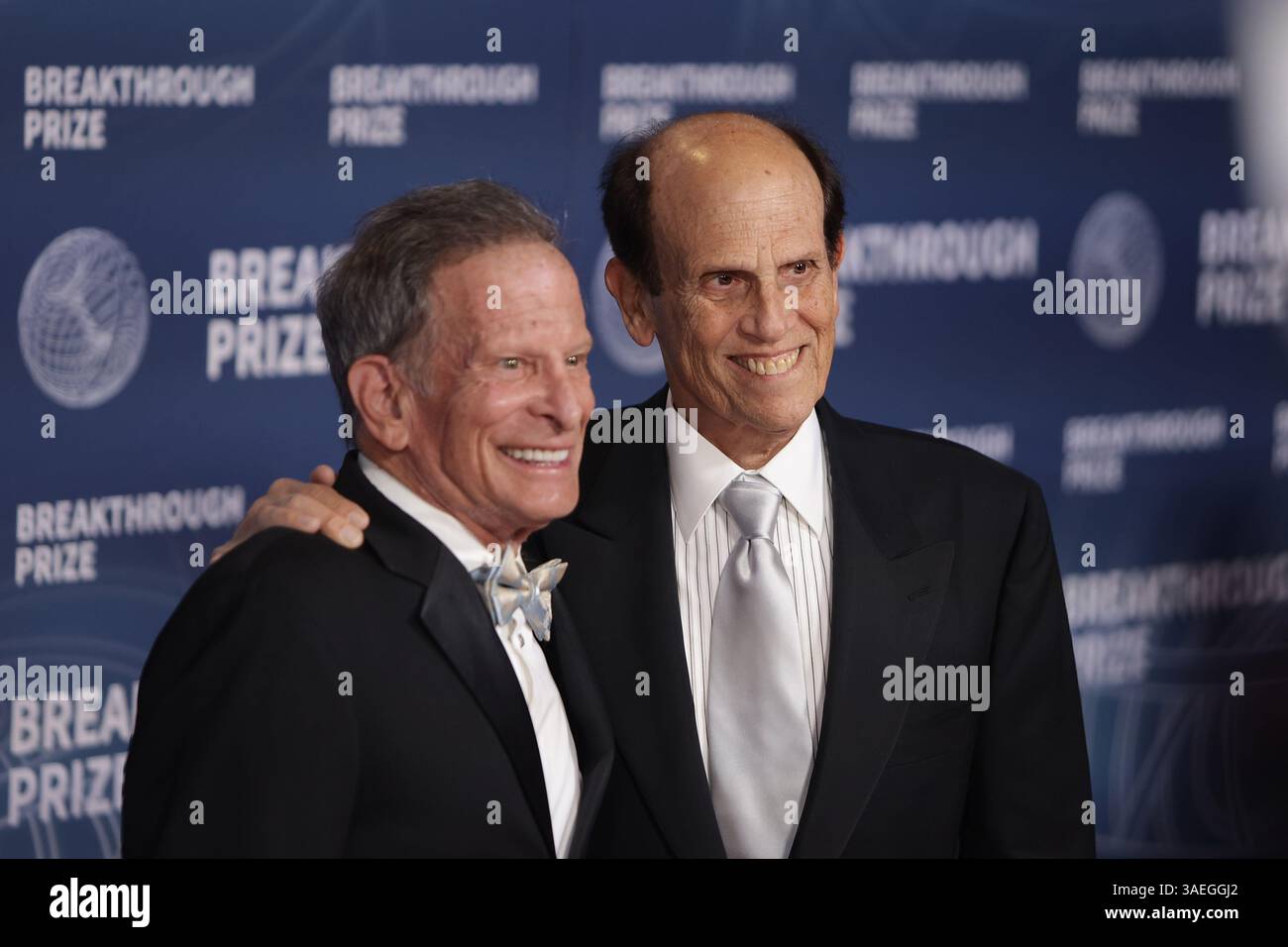 Santa Monica, USA. 06th Apr, 2025. Michael Milken (R) and guest attend ...