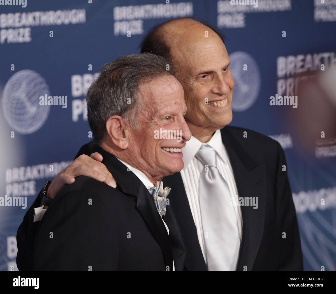 Santa Monica, USA. 06th Apr, 2025. Michael Milken (R) and guest attend ...