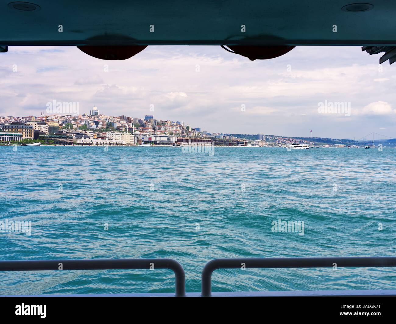View of Istanbul cityscape and Bosphorus strait from a ferry, framed by ...
