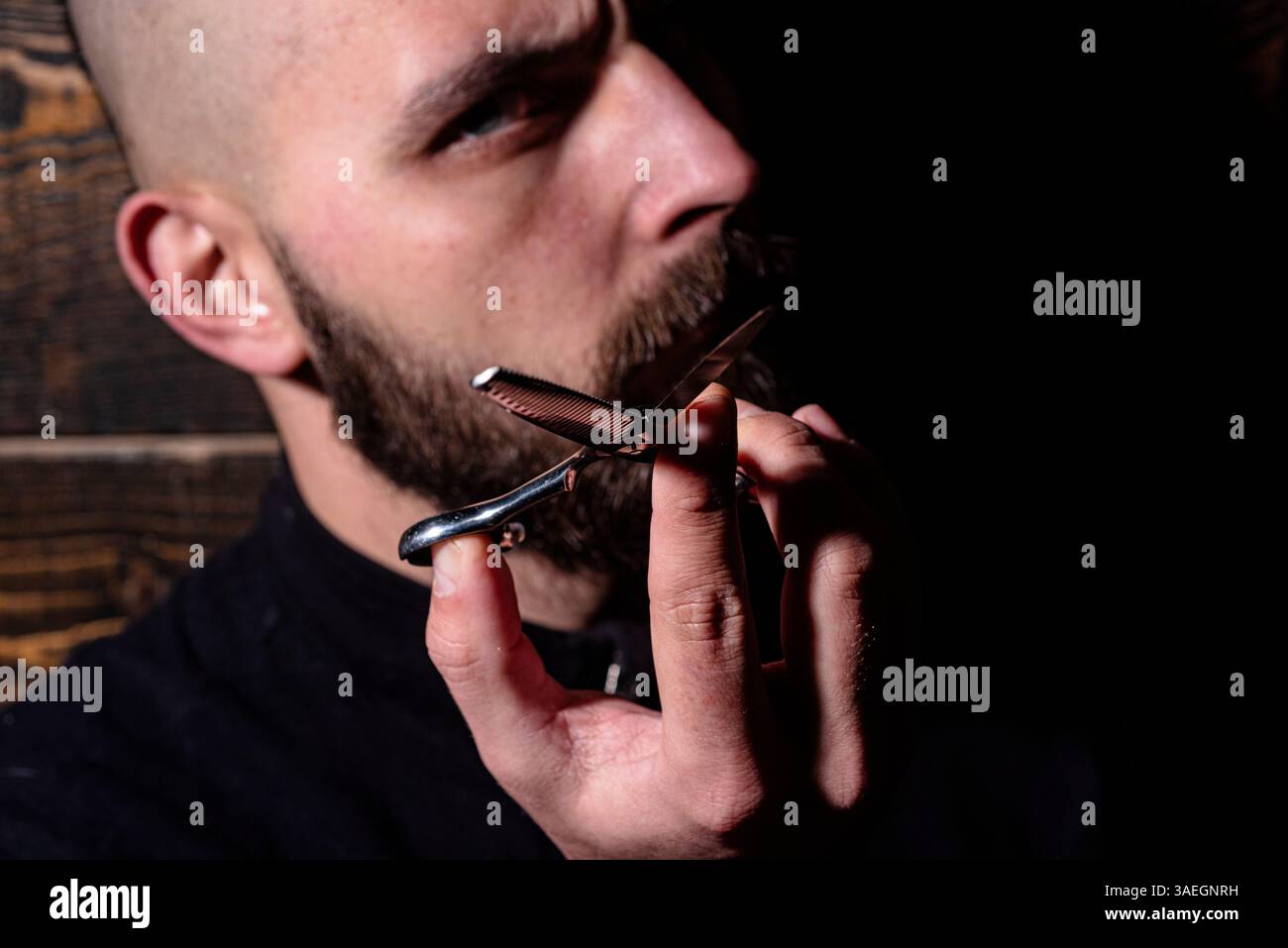 Barbershop advertising. Serious barber. Men hairstyle and haircut. Man ...