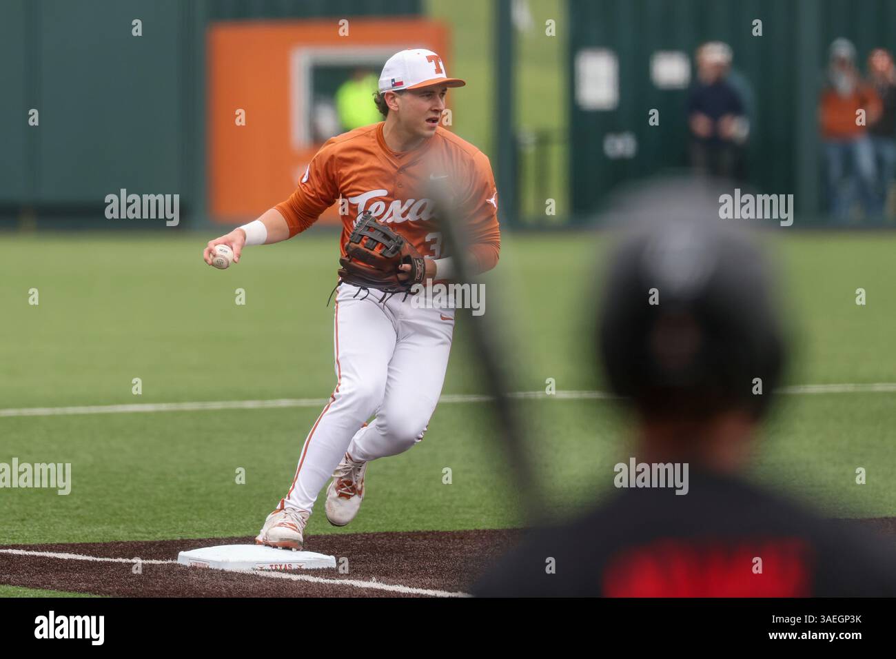 AUSTIN, TX - APRIL 06: Texas infielder Casey Borba (31) touches third ...