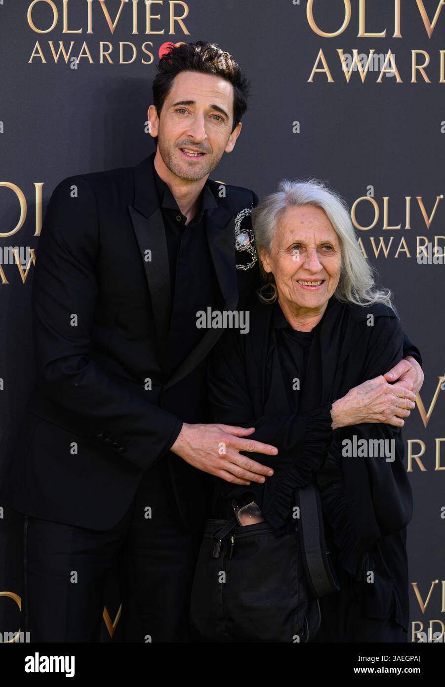 London, UK. April 6th, 2025. Adrien Brody and mother arriving at The ...