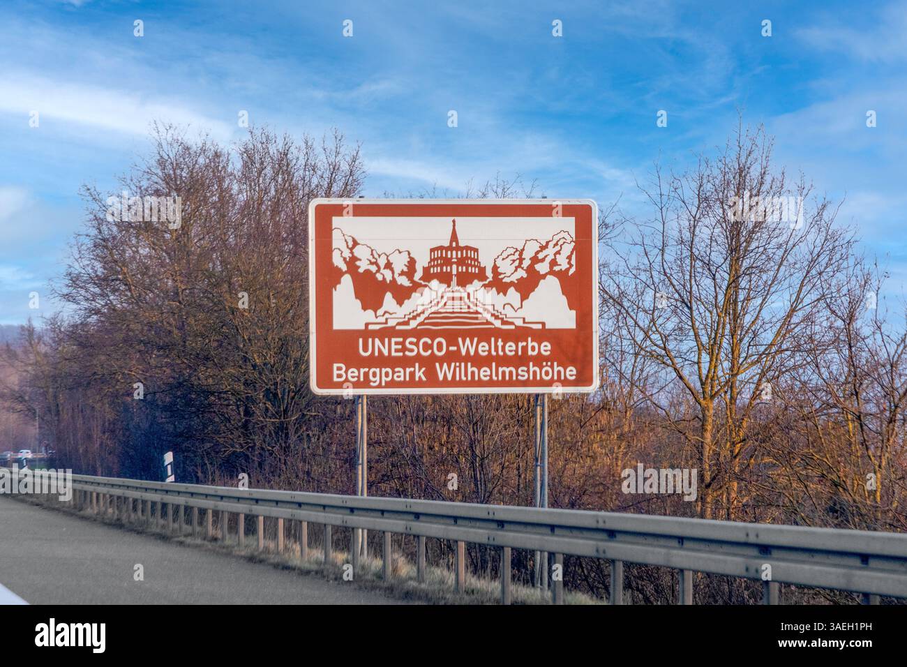 brown landmark signs at the highway pointing out the scenic unesco ...