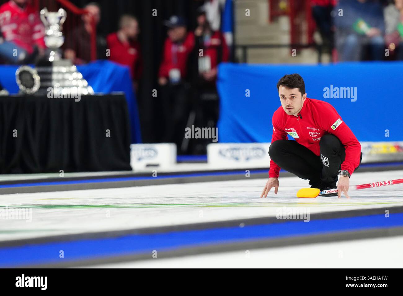 Switzerland skip Benoit Schwartz-Van Berkel watches his stone during ...