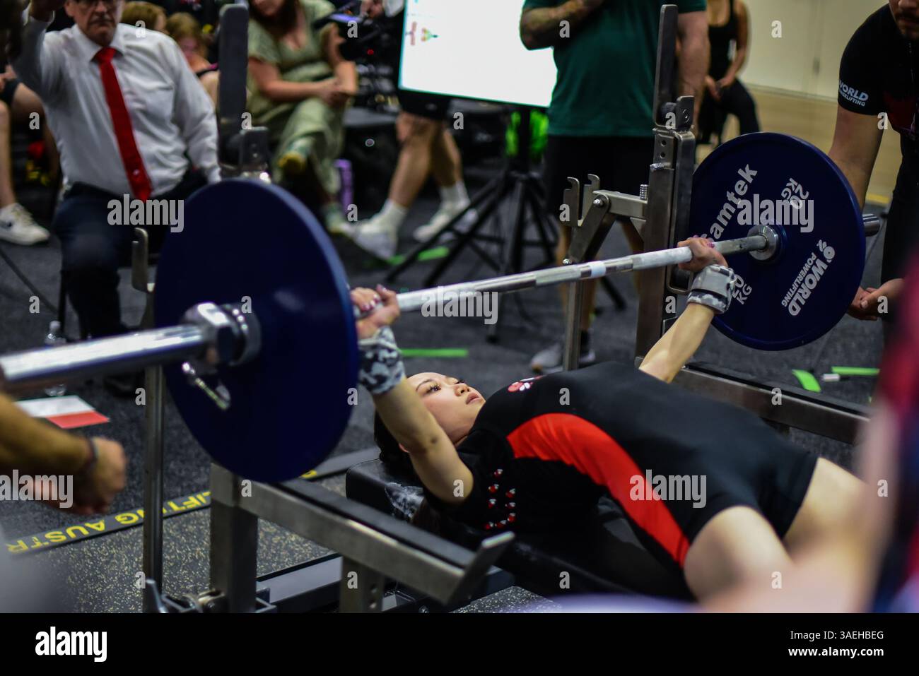 Rose Li of Australia is seen lifting 65 kg bench press at the Asia ...