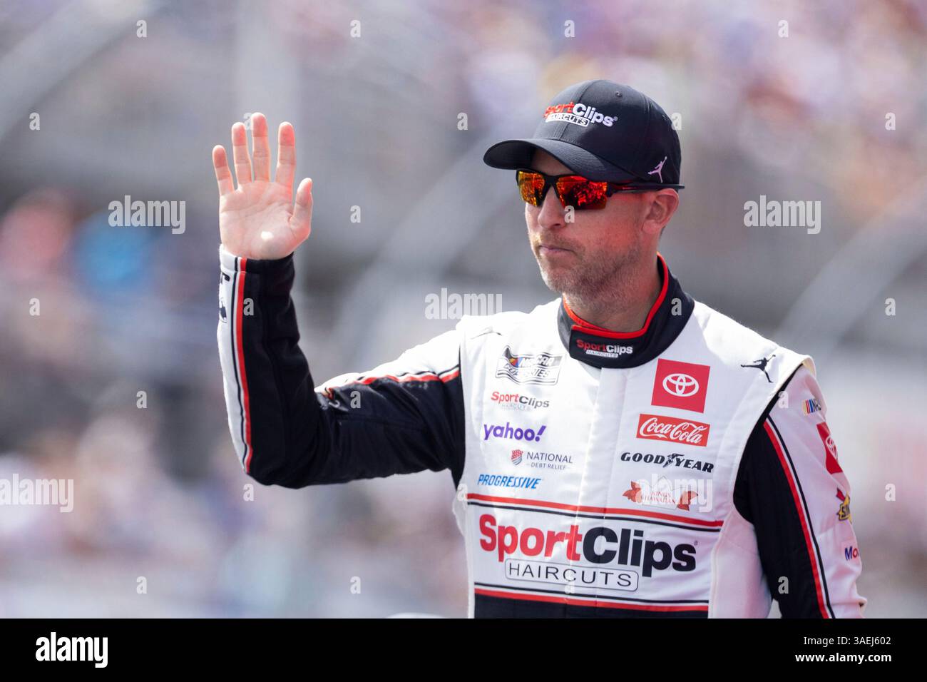 NASCAR Cup Series driver Denny Hamlin (11) waves to fans before a ...