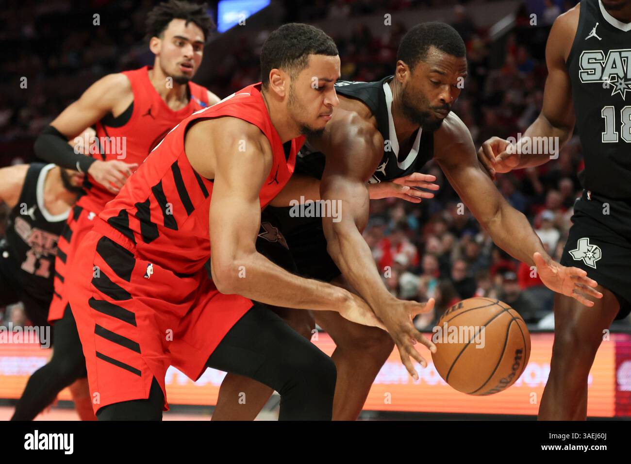 Portland Trail Blazers forward Kris Murray, left, and San Antonio Spurs ...