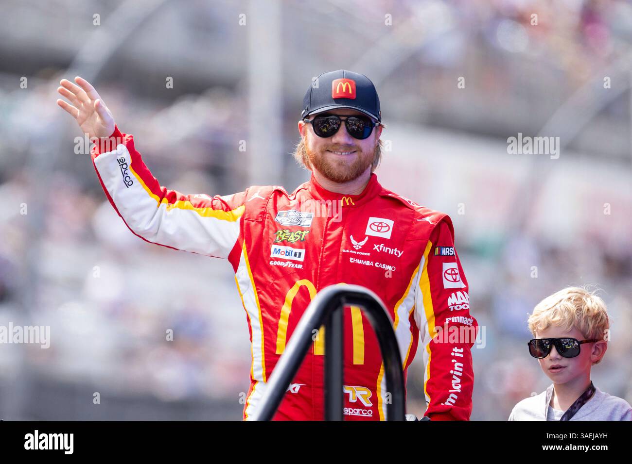 Driver Tyler Reddick waves to fans before a NASCAR Cup Series auto race ...