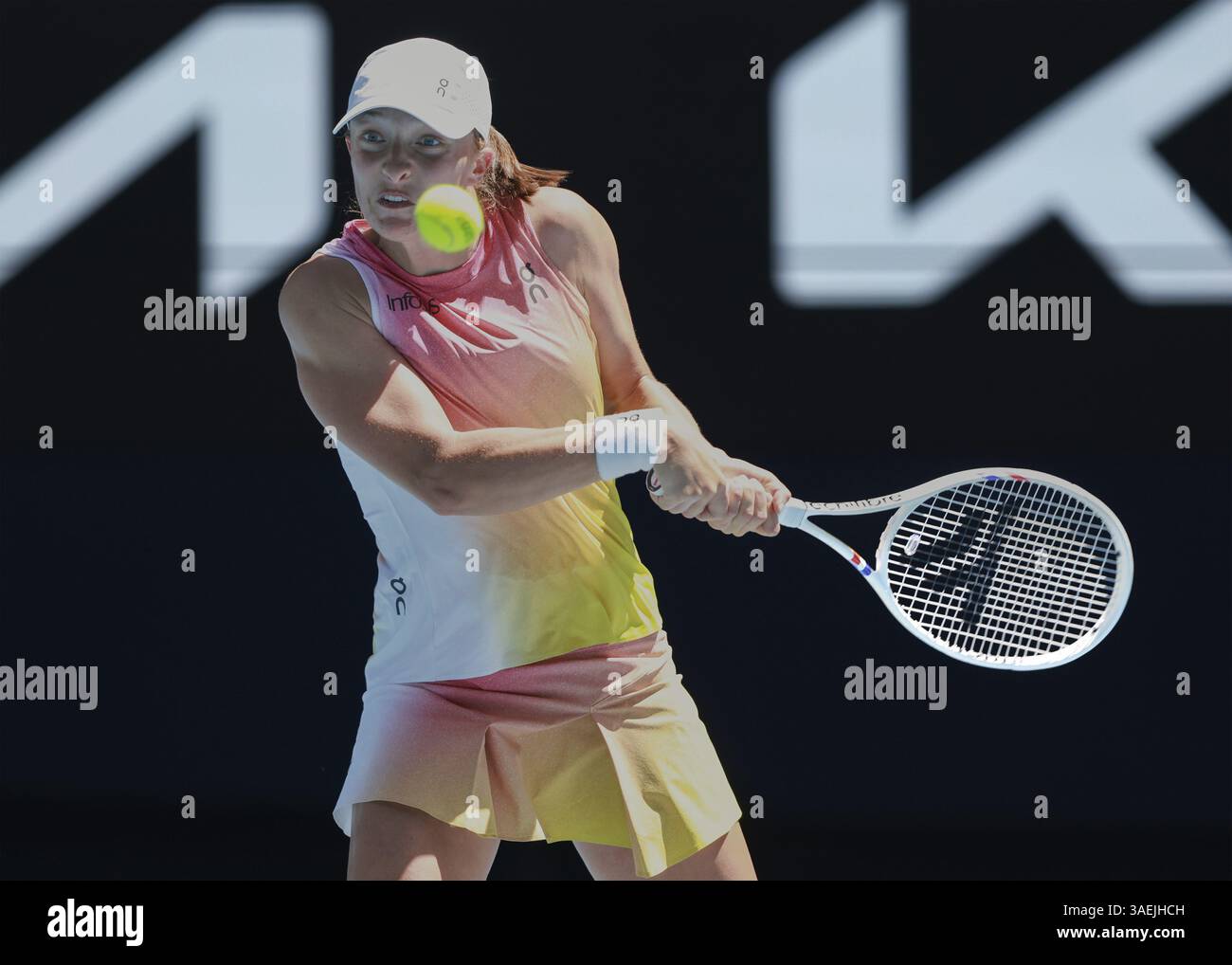 Polish tennis player Iga Swiatek playing a backhand shot at the ...