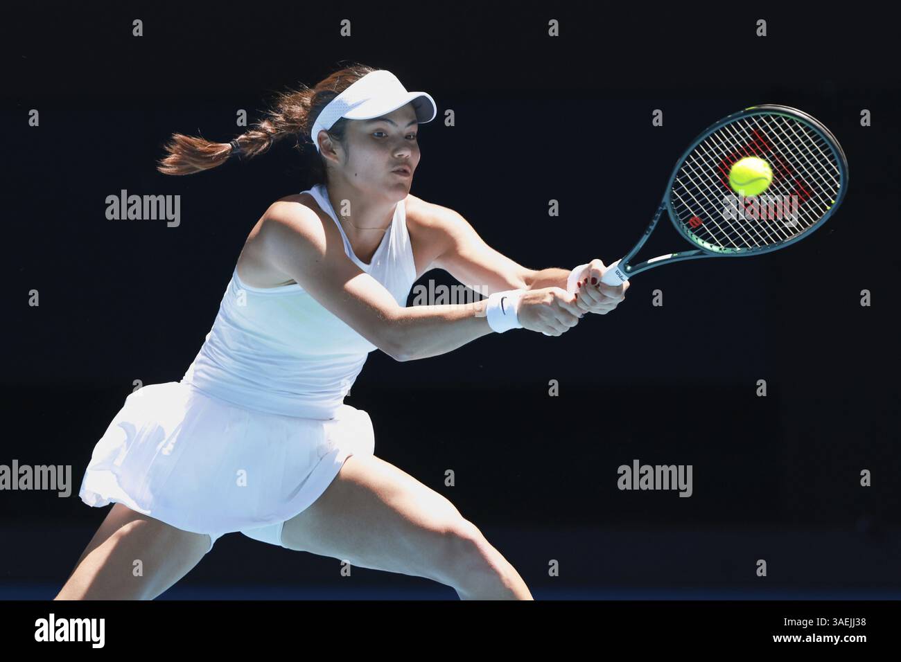 British tennis player Emma Raducanu (GBR) playing a backhand shot at the Australian Open 2025 ...