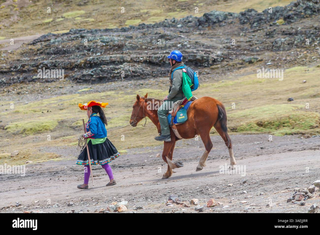 Peruvian people with horses offering tourists ride to the top of ...