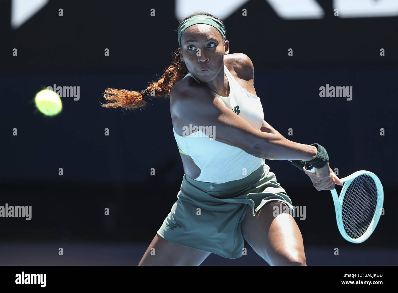 American tennis player Coco Gauff (USA) playing a backhand shot at the Australian Open 2025 ...