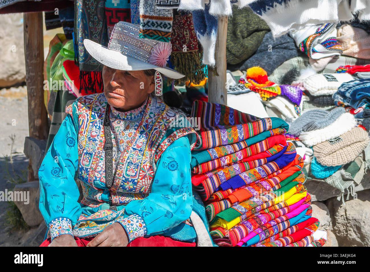 Peruvian traditional craft handmade dolls and textile. Colorful clothes ...