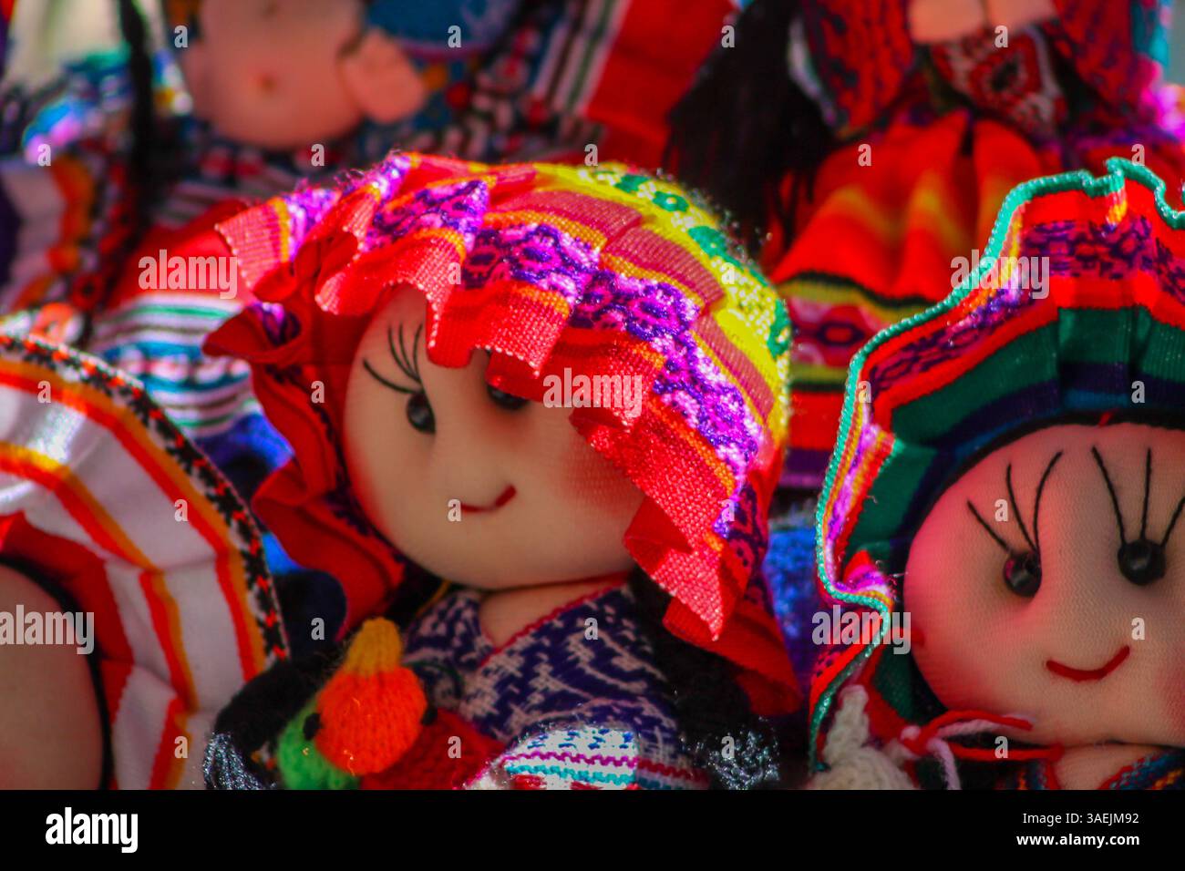 Peruvian traditional craft handmade dolls and textile. Colorful clothes ...