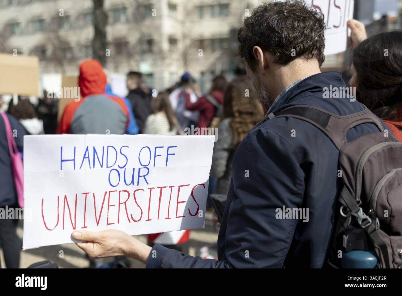 Berlin, Germany - 5 April 2025: A protester holds a sign reading Hands ...