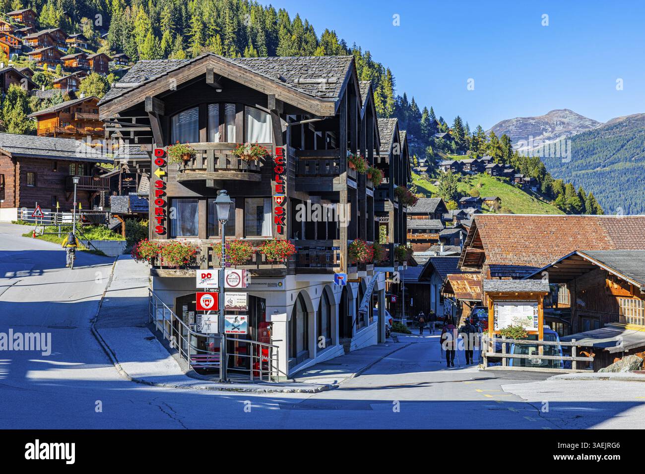 Pedestrians in the main street of Grimentz, Val d'Anniviers, Valais ...