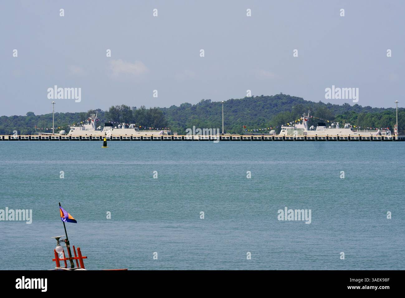 Photo taken on April 5, 2025, shows two Chinese naval vessels docked at ...
