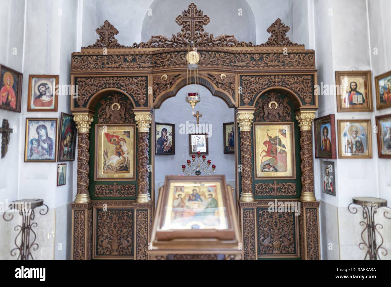 Iconostasis with a large number of Orthodox icons in a small church Stock Photo - Alamy