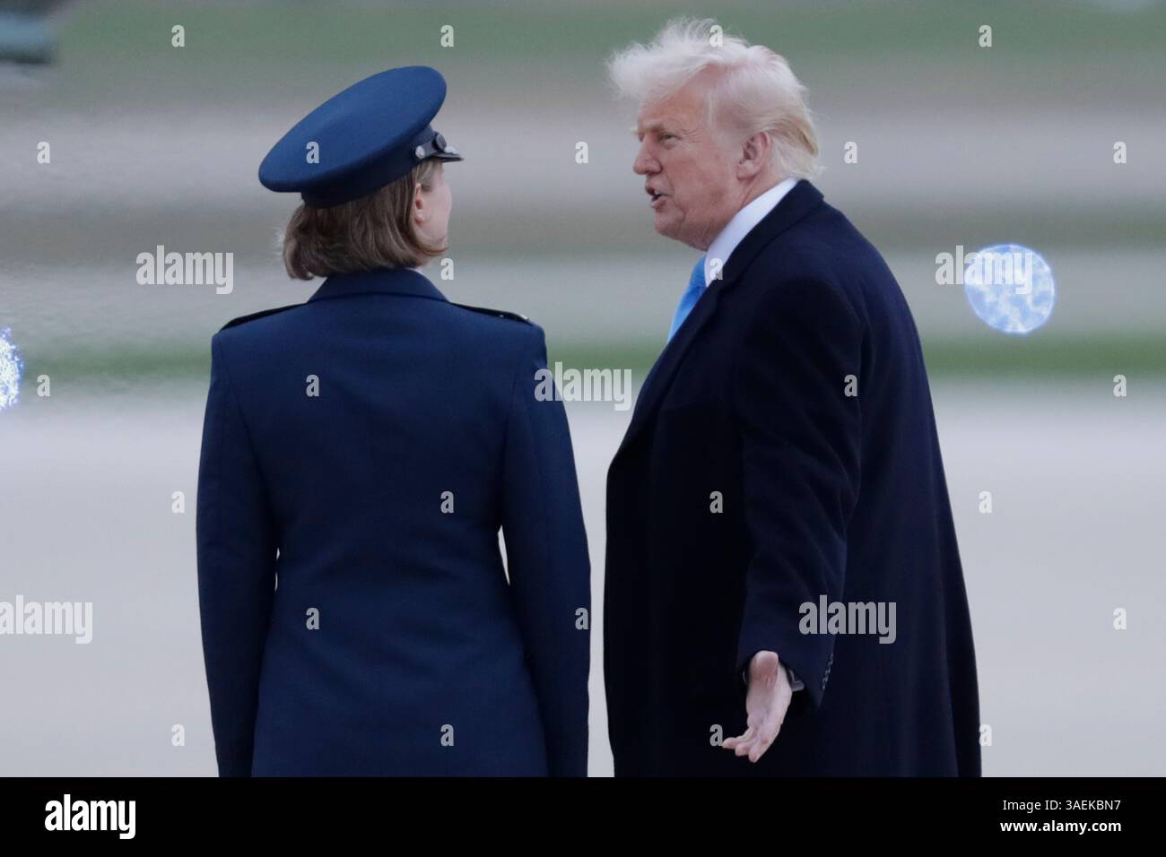 President Donald Trump, right, talks with Air Force Col. Angela F ...