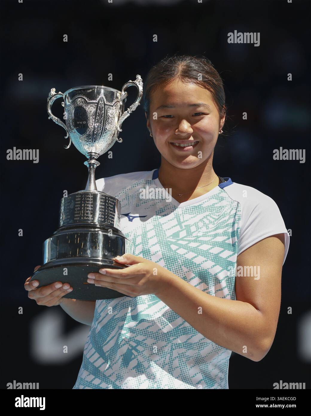 Japanese Junior Grand Slam winner Wakana Sonobe (JPN) holding up the ...