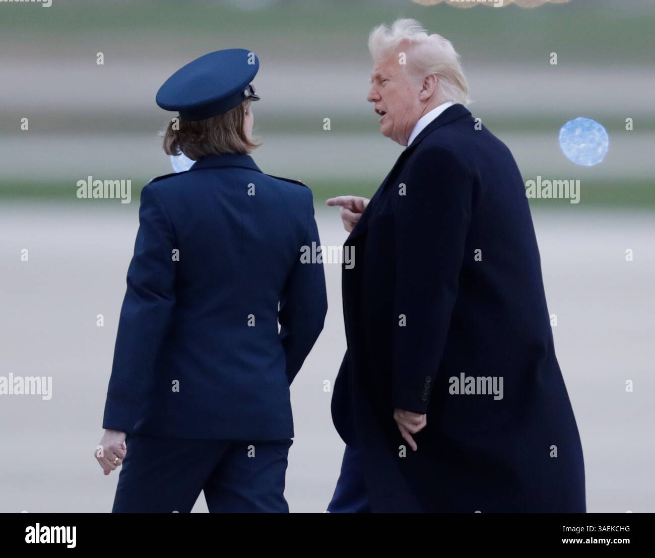 President Donald Trump, right, talks with Air Force Col. Angela F ...