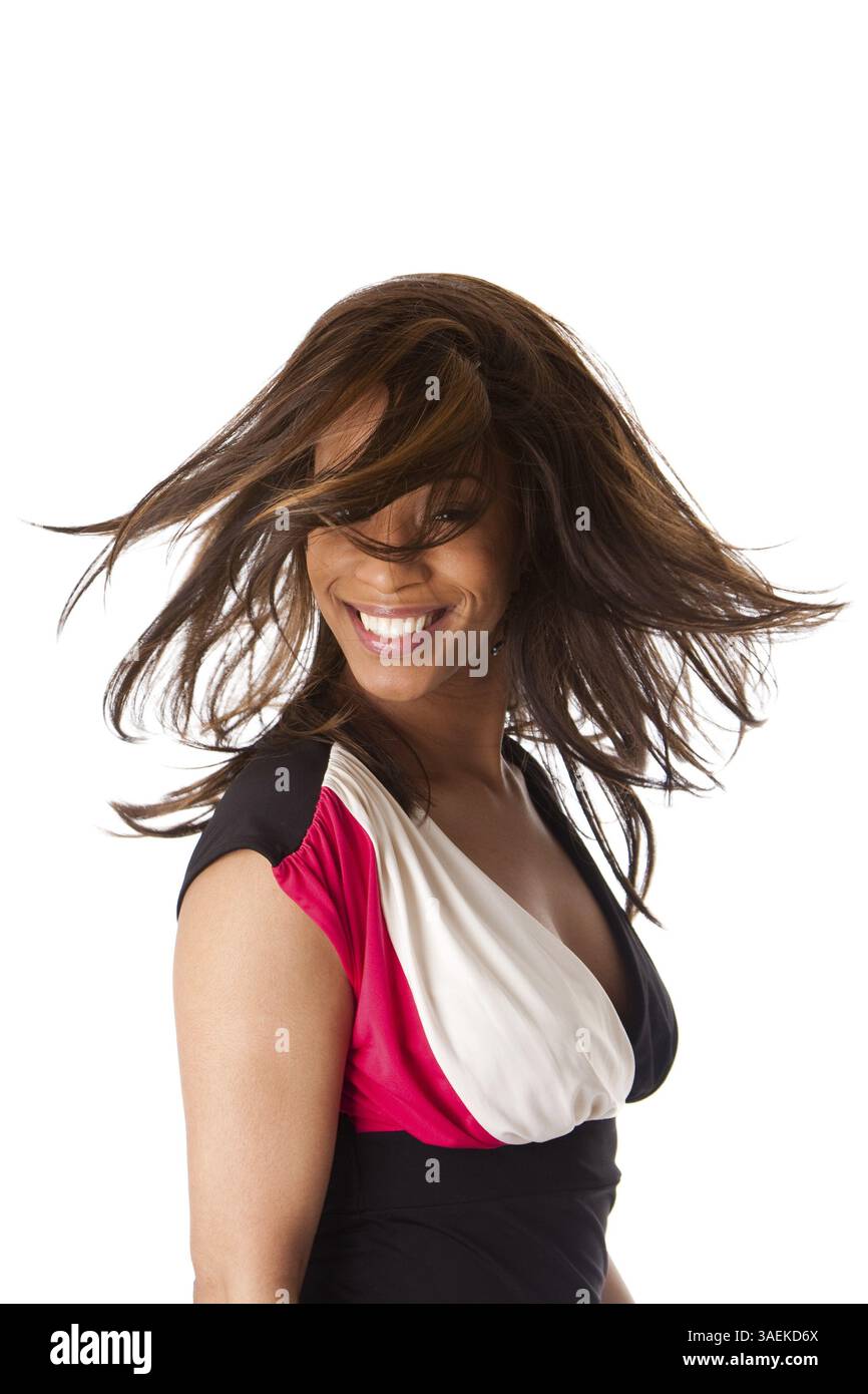 Beautiful happy smiling African American business woman in black with white and pink dress ...